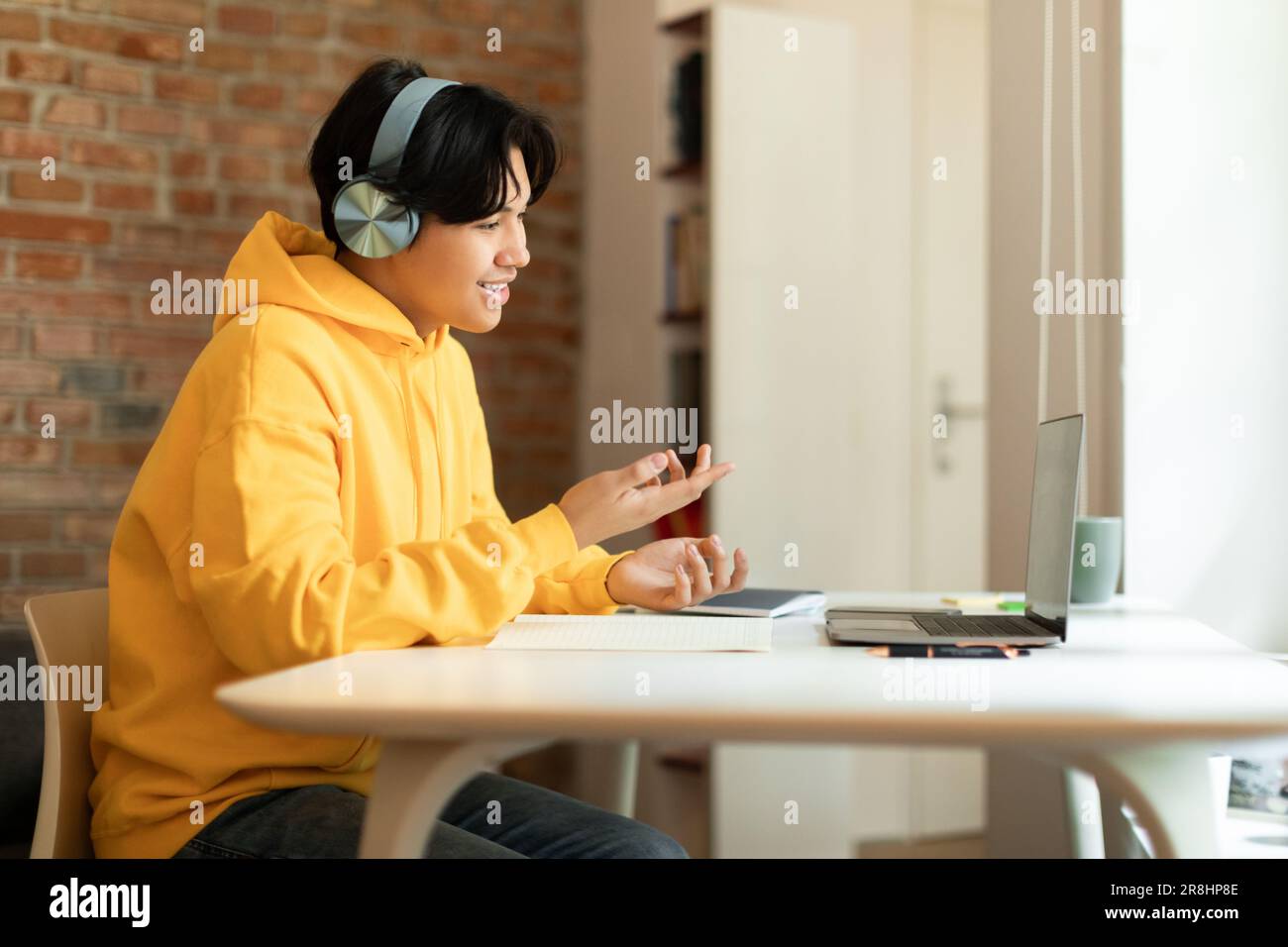 Korean Student Boy Talking To Laptop During Remote Class Indoor Stock ...