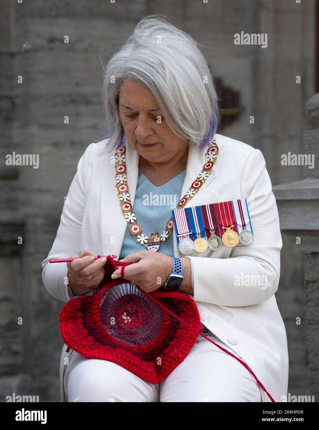 Ottawa, Canada. 21st June, 2023. Governor General Mary Simon crochet‚Äôs a piece for an artwork ...
