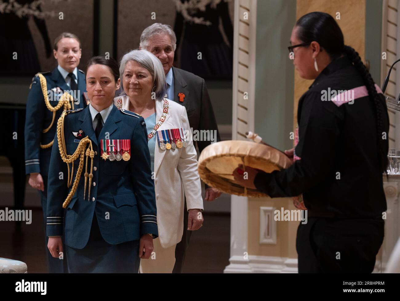 Ottawa, Canada. 21st June, 2023. An indigenous drummer welcomes Governor General Mary Simon and ...
