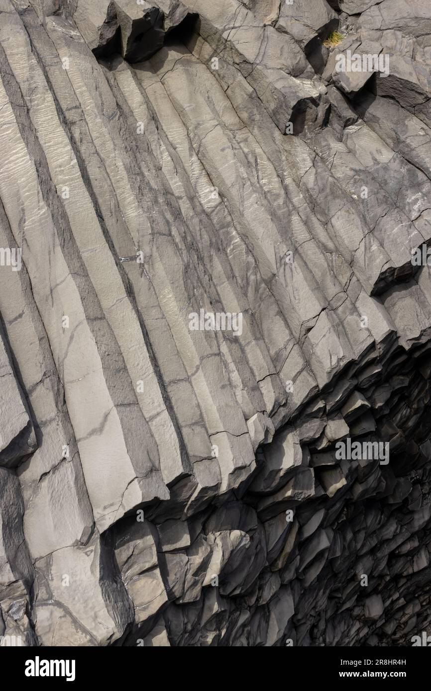 Detail of a mountain with a cave, located on a beach. Fascinating ...