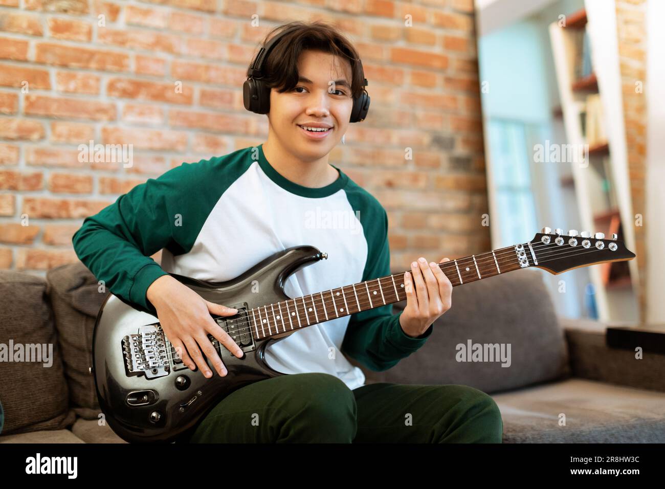 Positive Korean Teen Guy Mastering Electric Guitar Smiling Posing ...