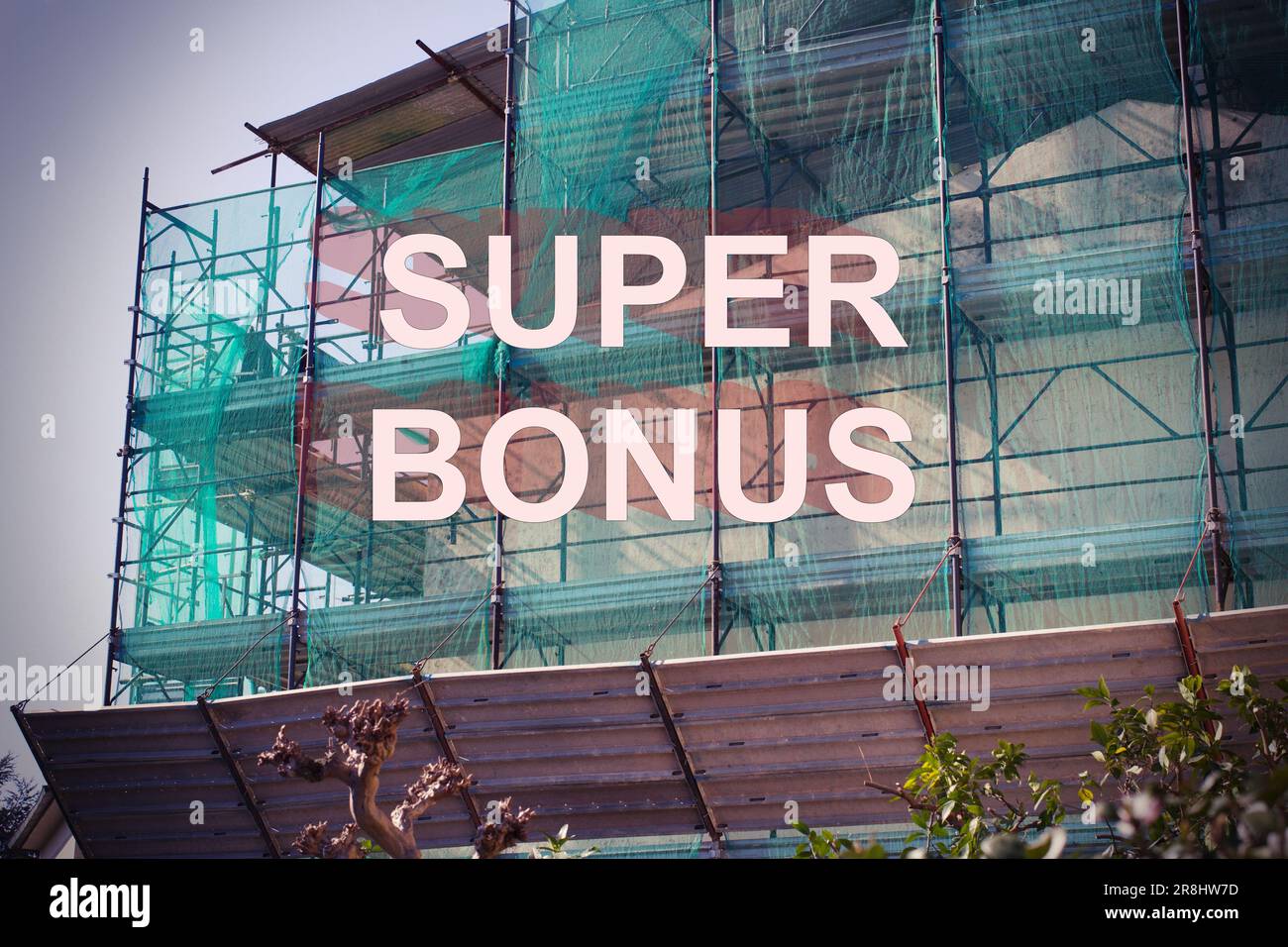 Shot of Building during renovation , with the sign “super bonus ...