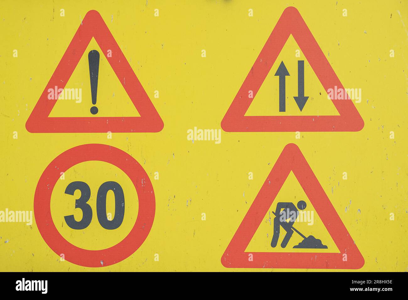 panel with warning signs at a construction site Stock Photo - Alamy