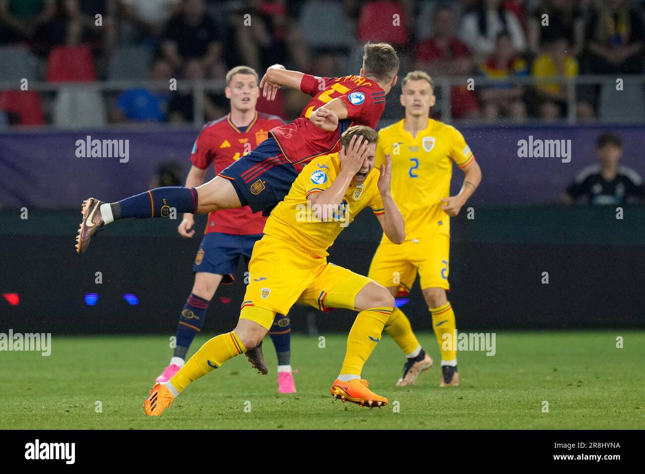 Louis Munteanu of Romania screams after a contact with Jon Pacheco of Spain during the Euro 2023 ...