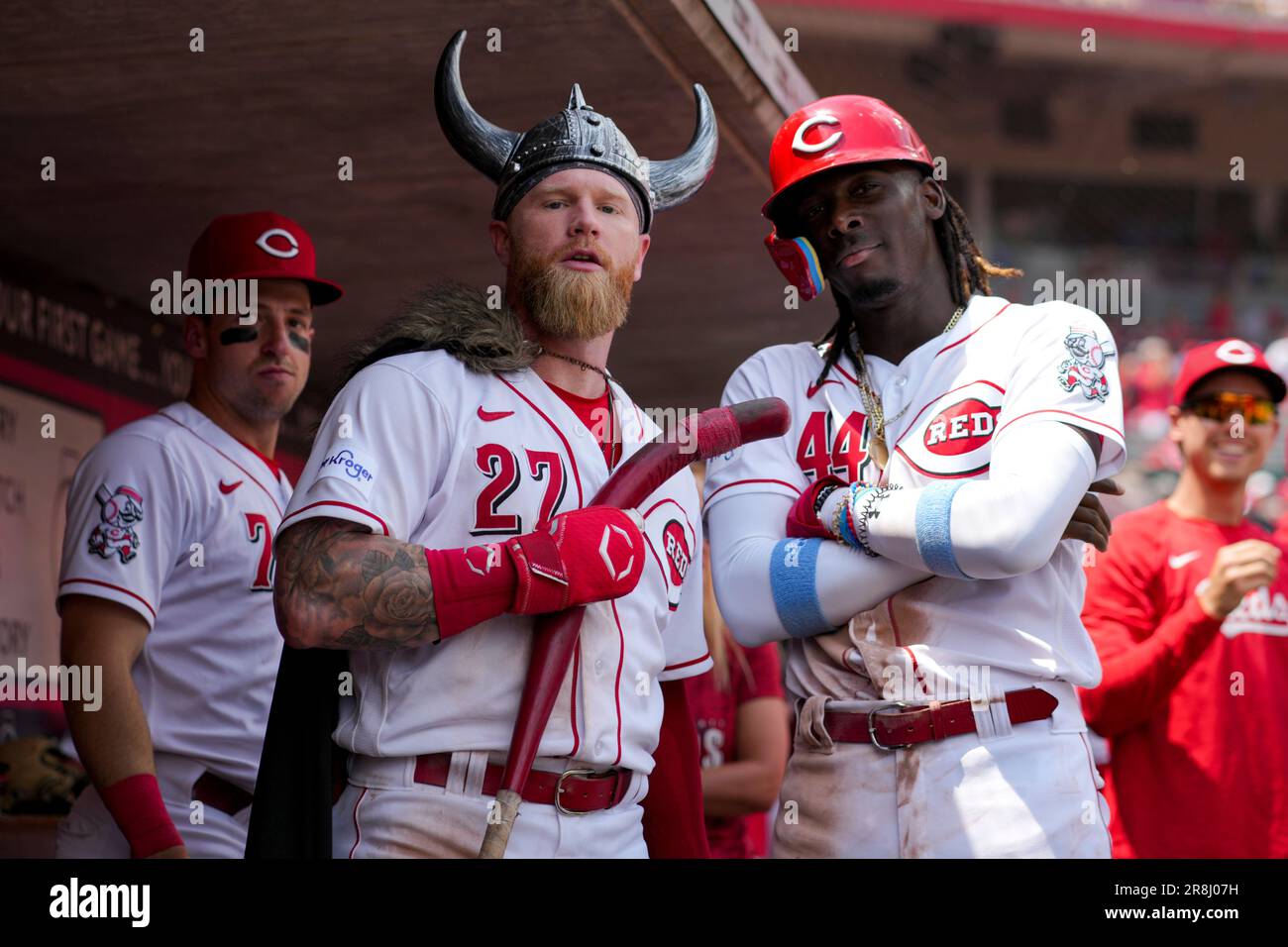 Cincinnati Reds' Jake Fraley, left, poses with Elly De La Cruz after ...