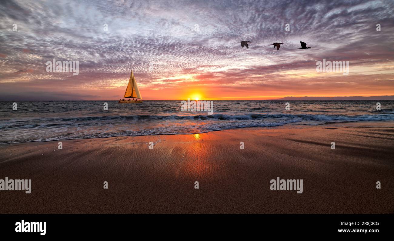 A Sailboat Is Sailing Along The Ocean With A Wave Breaking On Shore ...