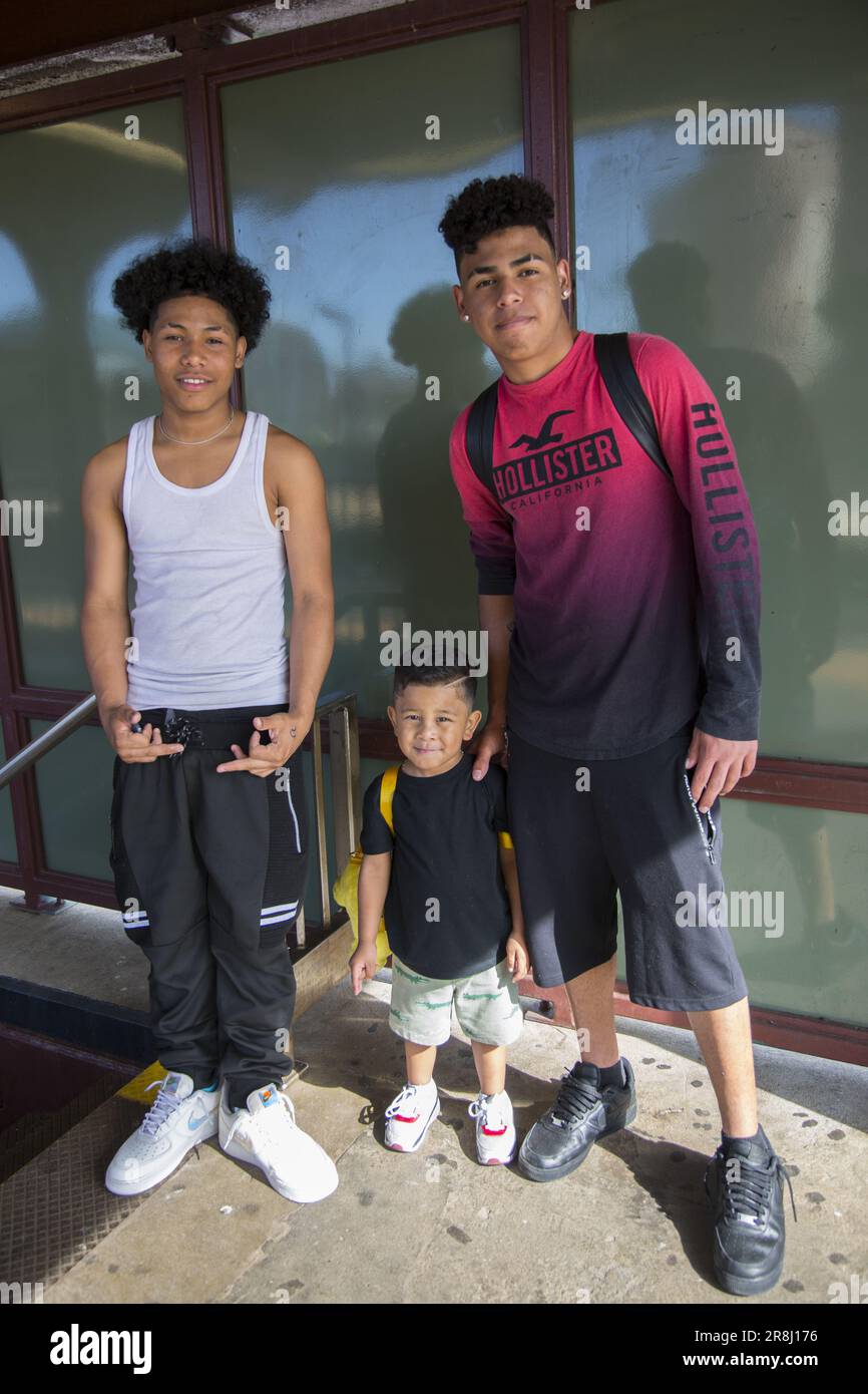 Immigrant boys with little brother anging out around Coney Island in ...
