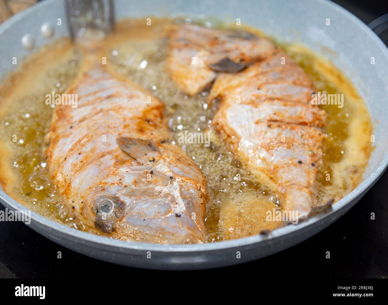 Clean and seasoned Peroá fish (Balistes capriscus) . Typical fish from ...