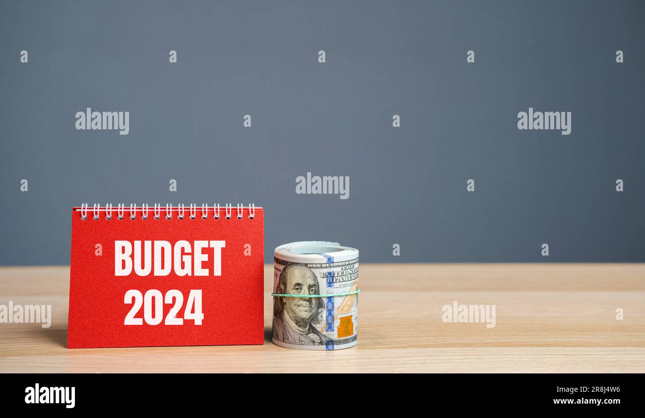 Notes with words Budget 2024 and dollar bills. Accumulating money and ...