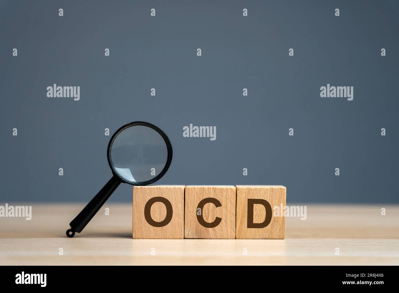 Wooden blocks with the abbreviation OCD. Obsessive compulsive disease ...