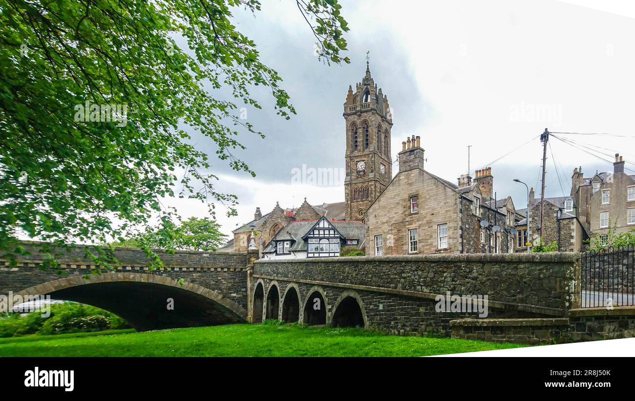 The Tweed Bridge over the River Tweed looking towards old Parish Church ...
