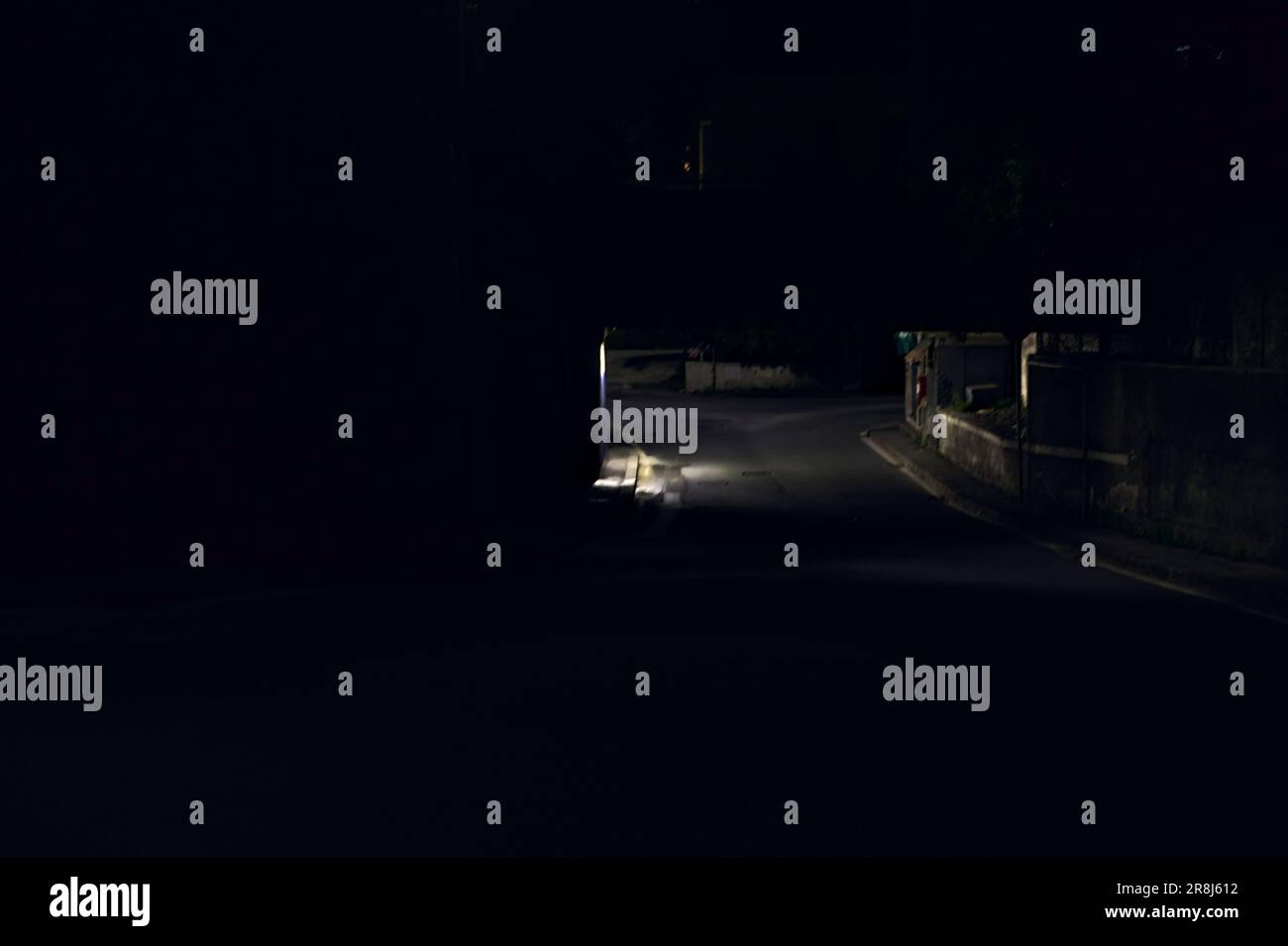 Underpass and pavement in an italian city at night Stock Photo - Alamy