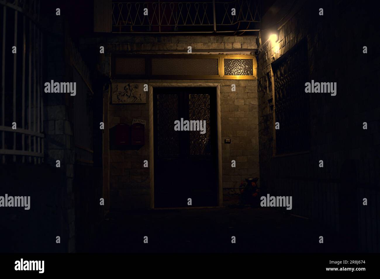 Entrance door of a house at night Stock Photo - Alamy