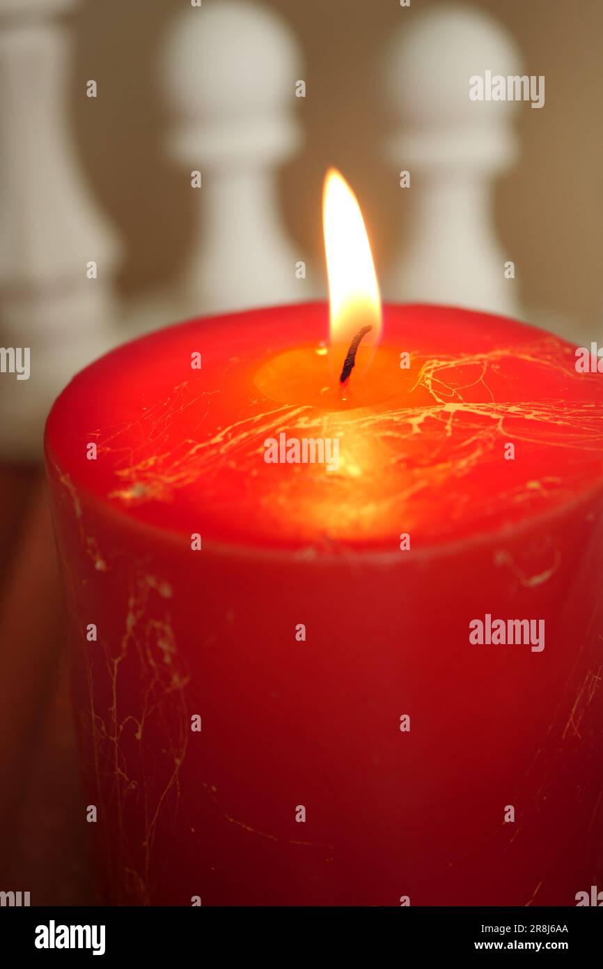 color candles slowly burning down in dark Stock Photo - Alamy