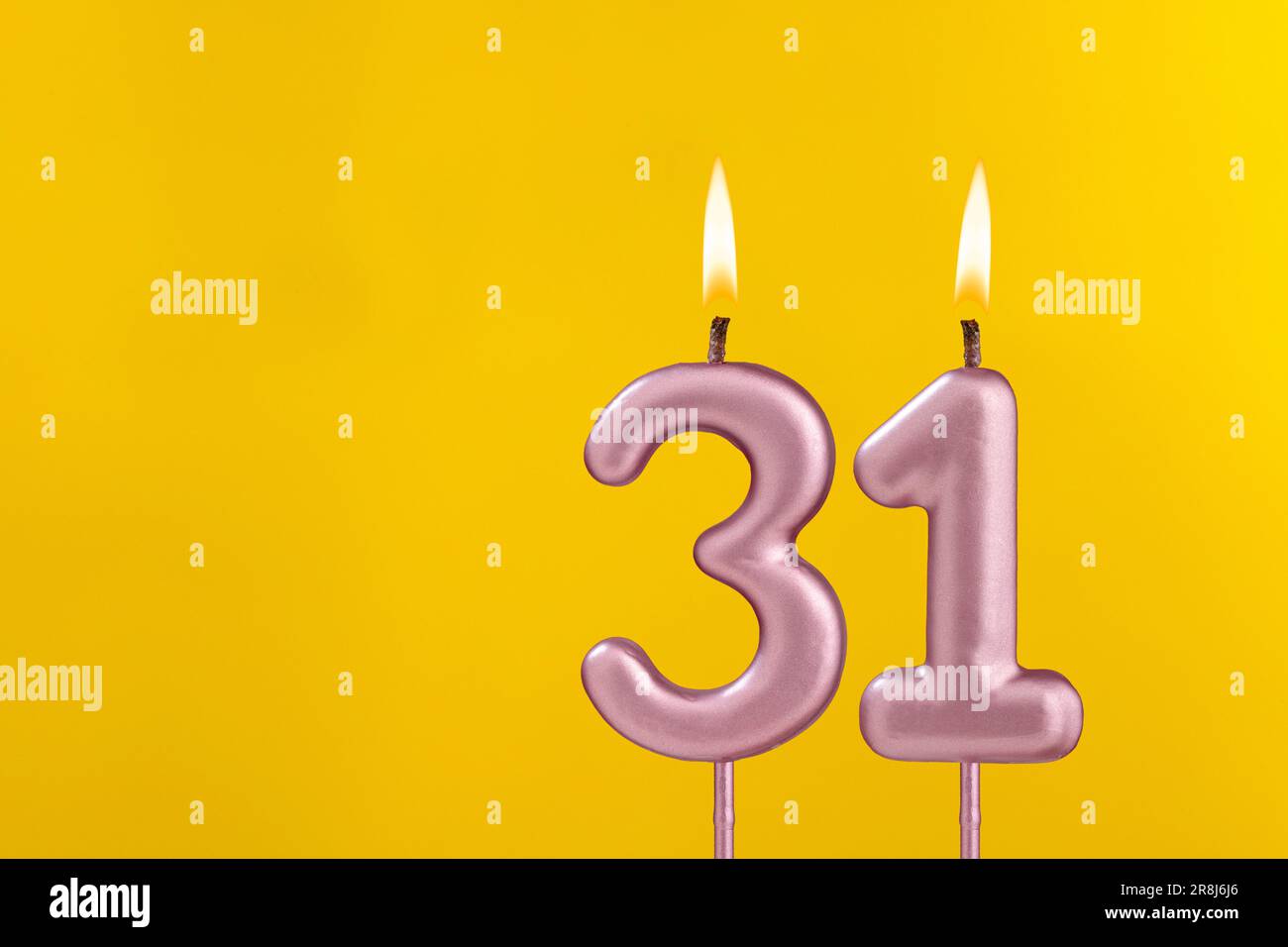 Birthday candle number 31 - Birthday celebration on yellow background ...