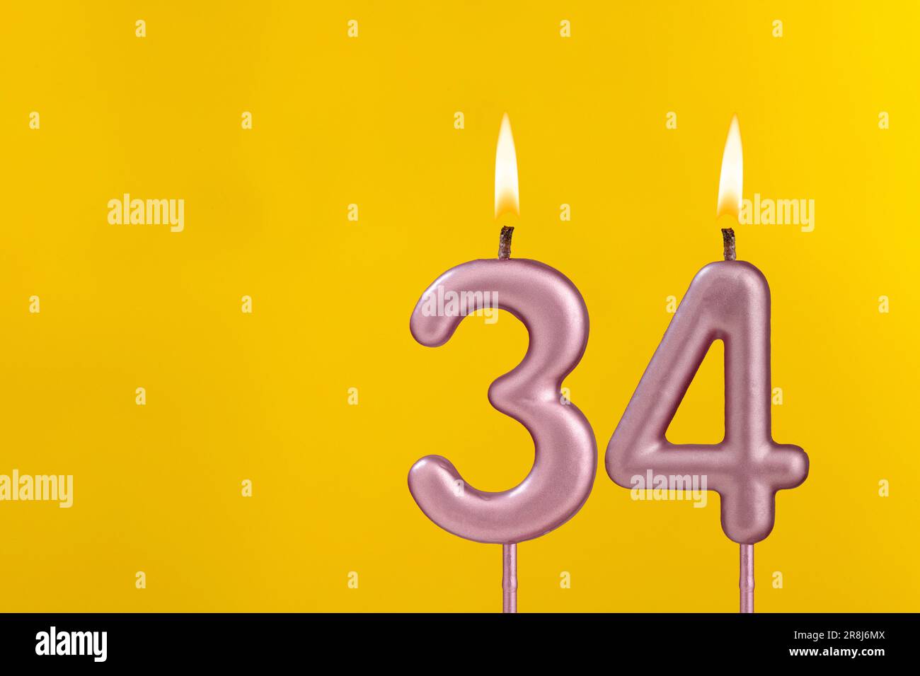 Candle 34 with flame - Birthday card on yellow luxury background Stock ...