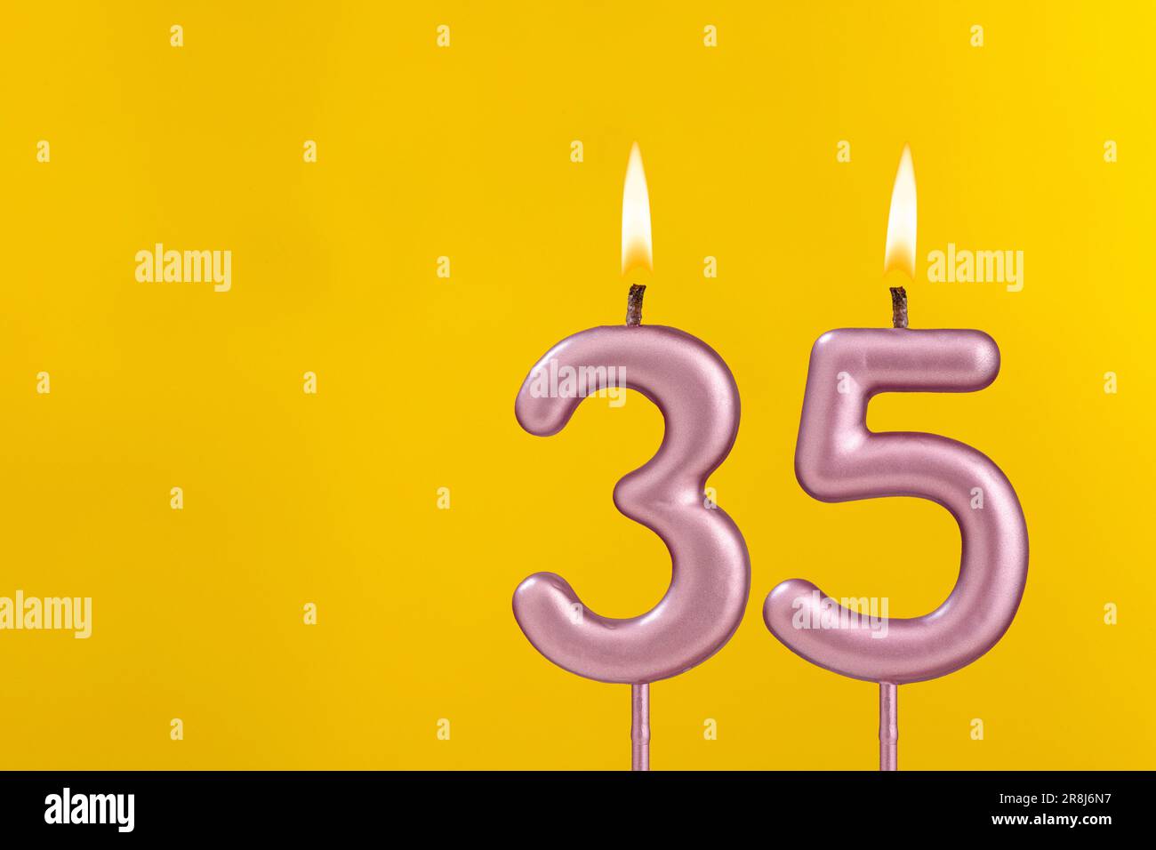 Birthday candle number 35 - Birthday celebration on yellow background ...