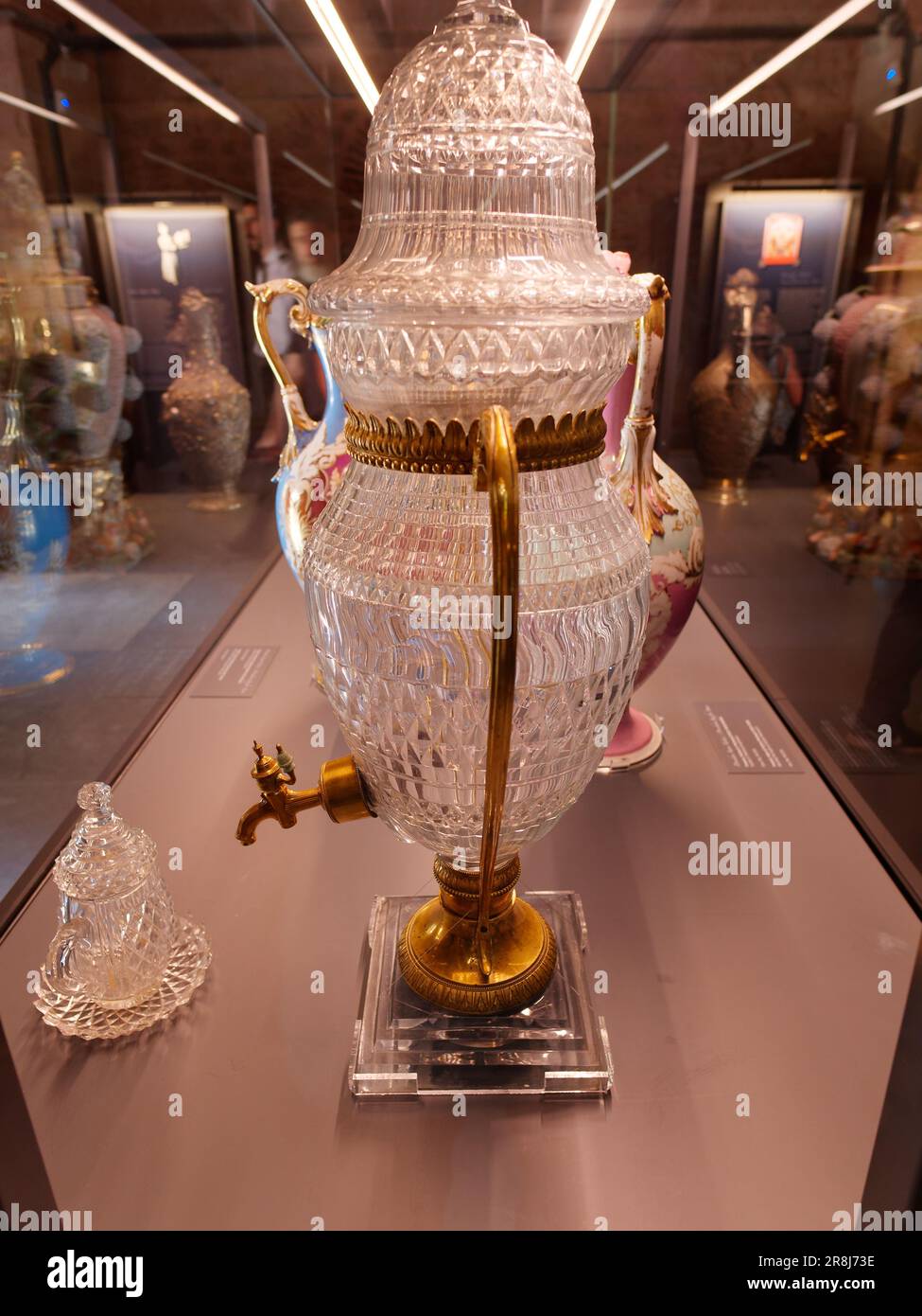 Glass tea pourer on display in glass cabinets in the Topkapi Palace ...