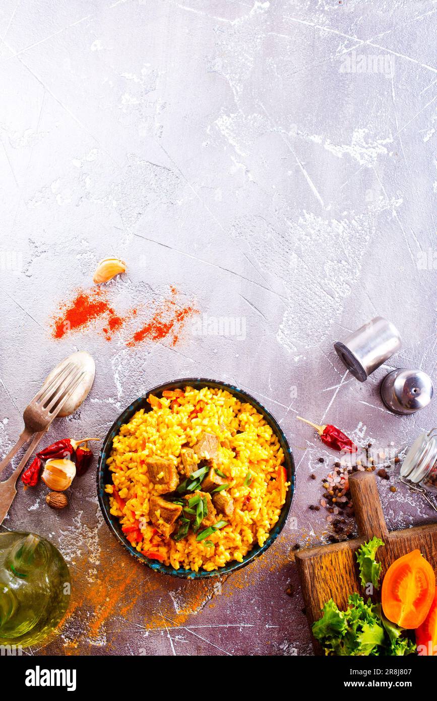 National Uzbek pilaf with meat,. background image Stock Photo - Alamy