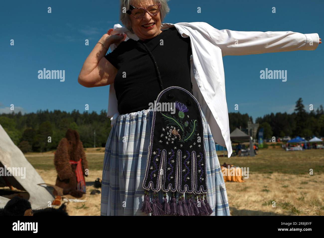 Victoria, Can. 21st June, 2023. Elder Jo-Ina Young wears her octopus ...