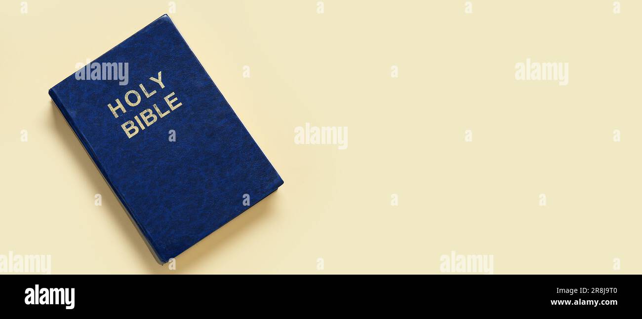 Holy Bible on beige background with space for text Stock Photo - Alamy