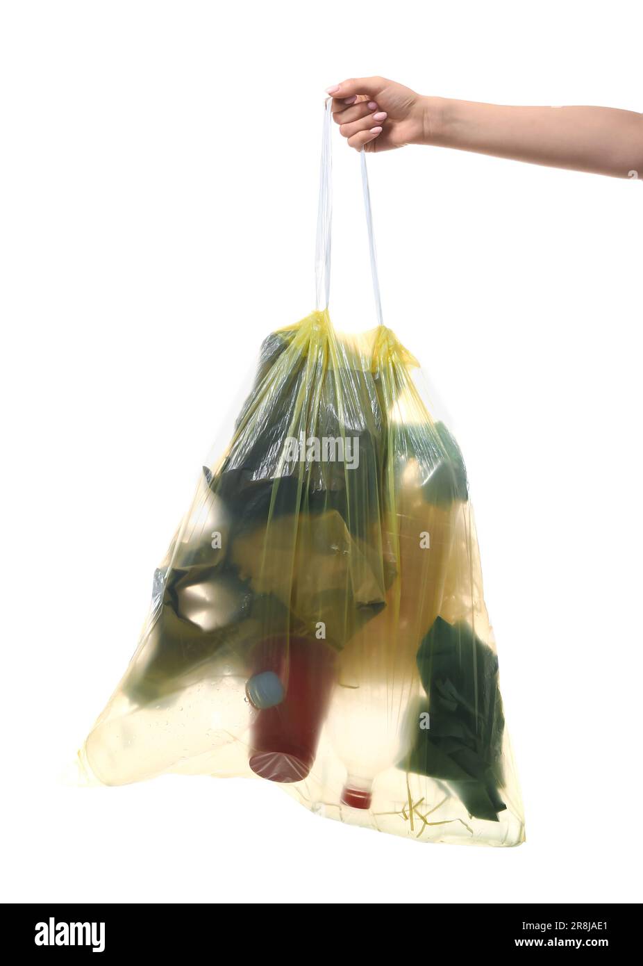 Female hand holding full garbage bag isolated on white background Stock ...