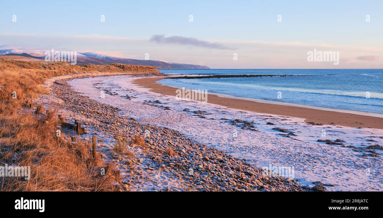 Brora beach in the Highlands in winter with snow on the sand Stock ...