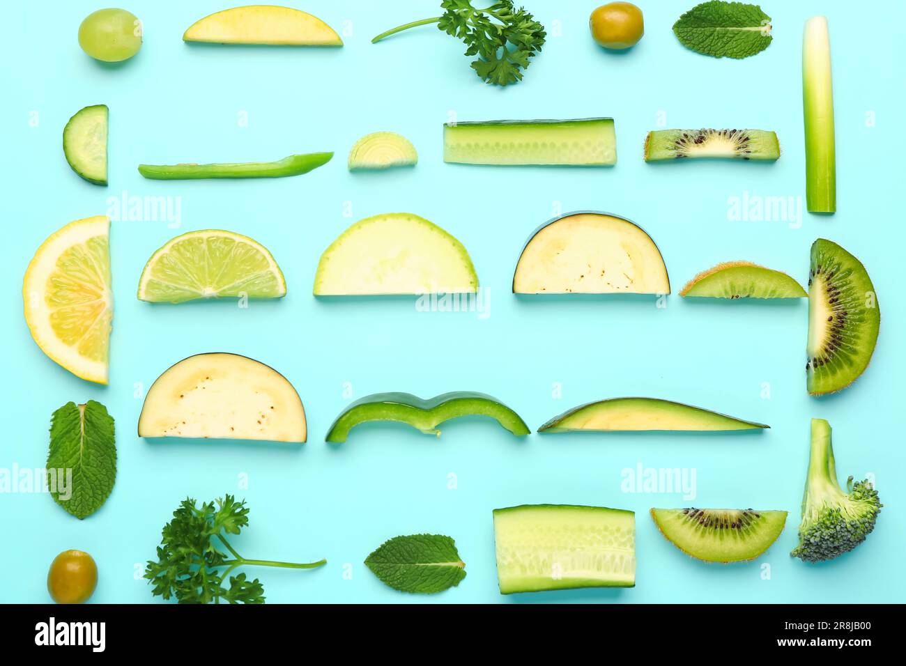 Composition with fresh fruits and vegetables on turquoise background ...