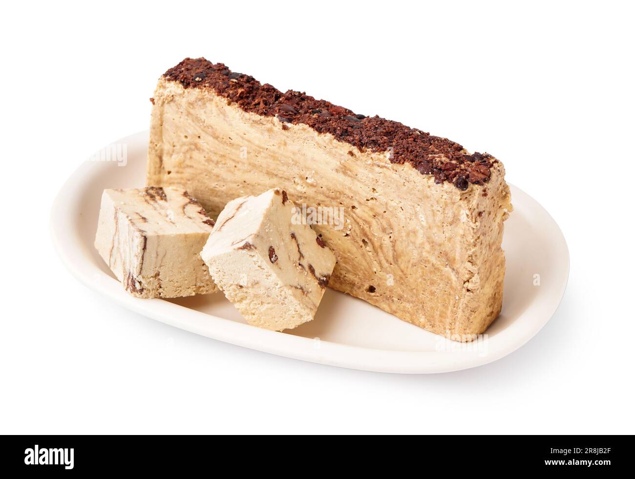 Plate with pieces of tasty marble halva on white background Stock Photo ...