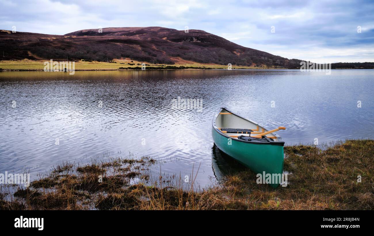 Canoe on the banks of Loch Brora in the Highlands Stock Photo - Alamy