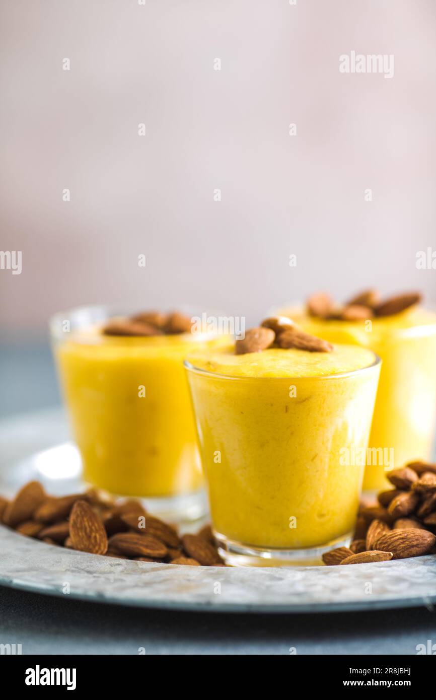 Authentic Indian cold drink made up of curd, milk malai called Lassi in ...