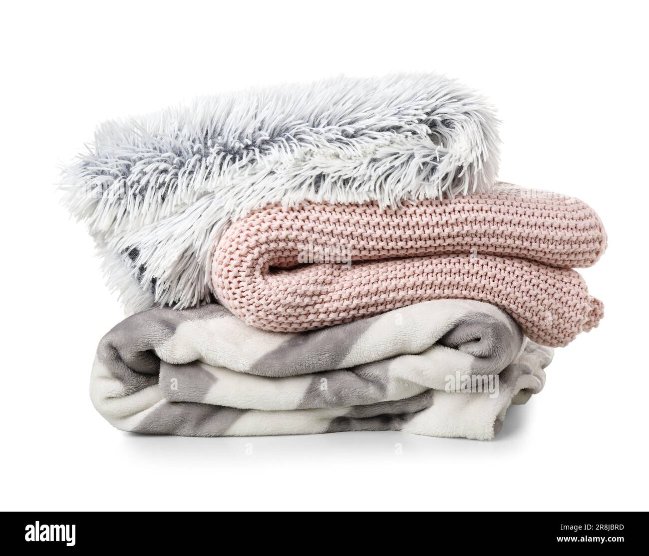 Different soft folded blankets on white background Stock Photo - Alamy
