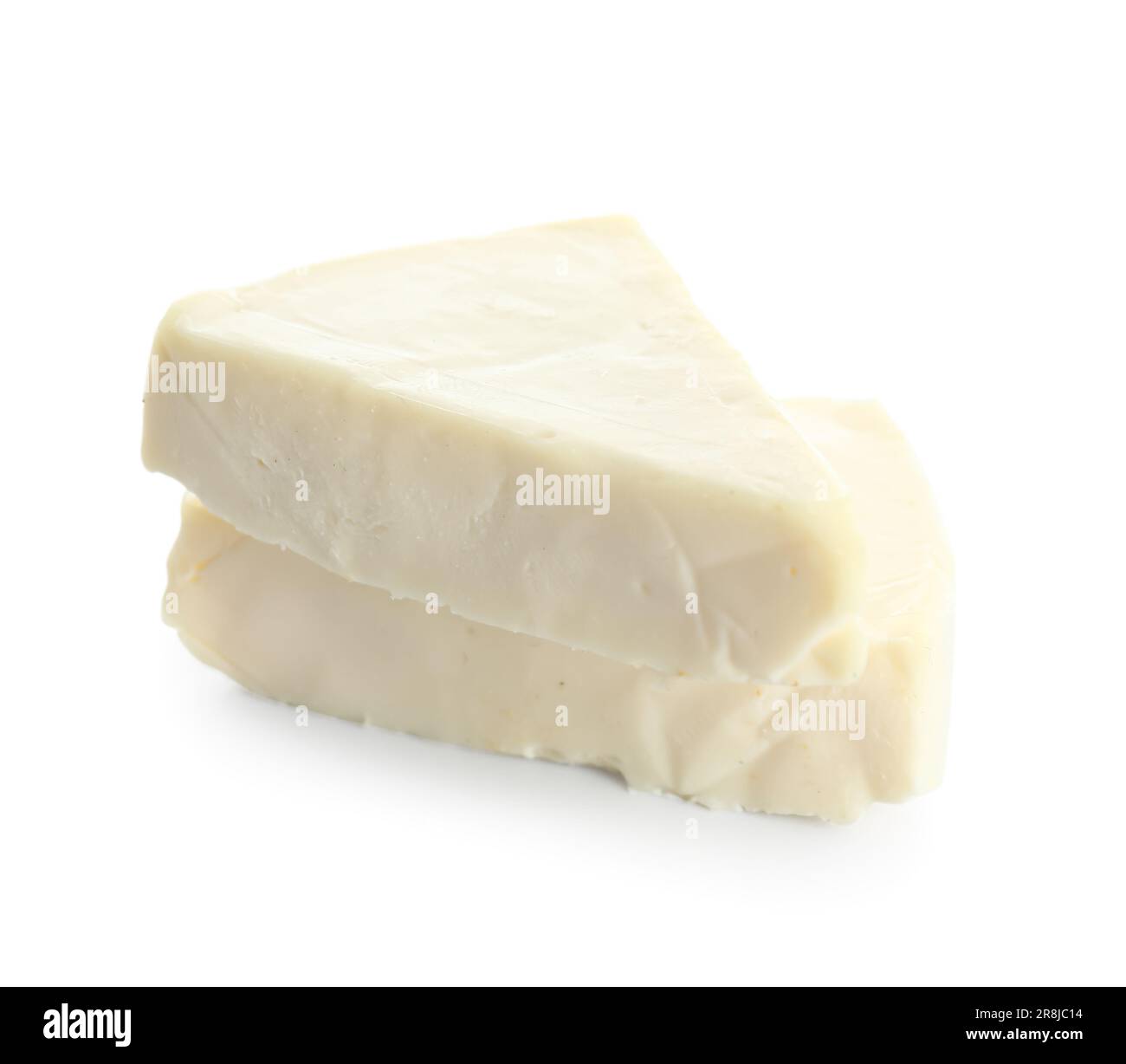 Triangles of tasty processed cheese on white background Stock Photo - Alamy