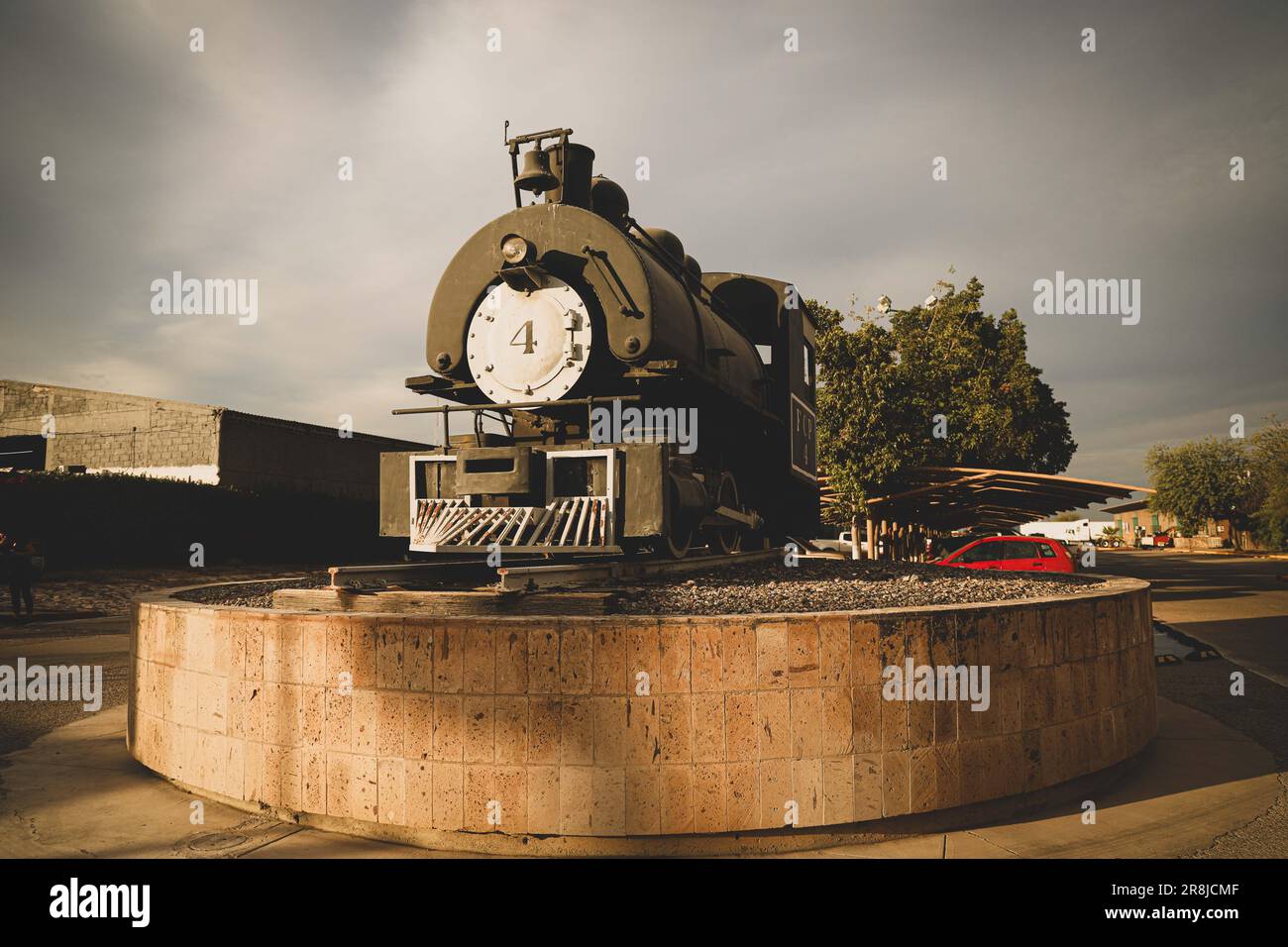 Old coal and steam train machine exhibited in the courtyards in ...
