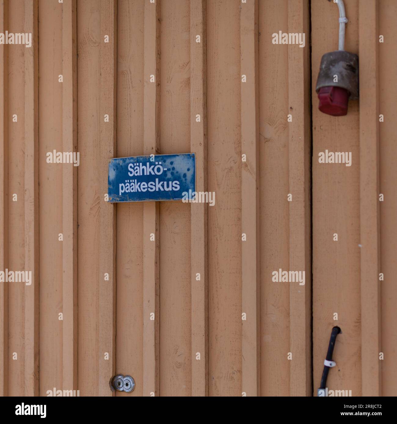 A blue electricity switchboard sign on a white background Stock Photo ...
