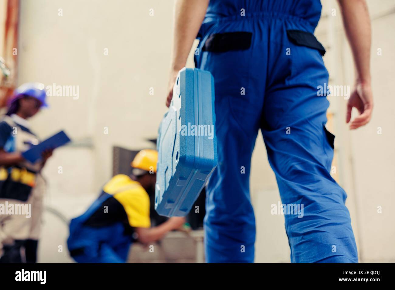 Diverse team of technicians contracted to repair damaged air ...