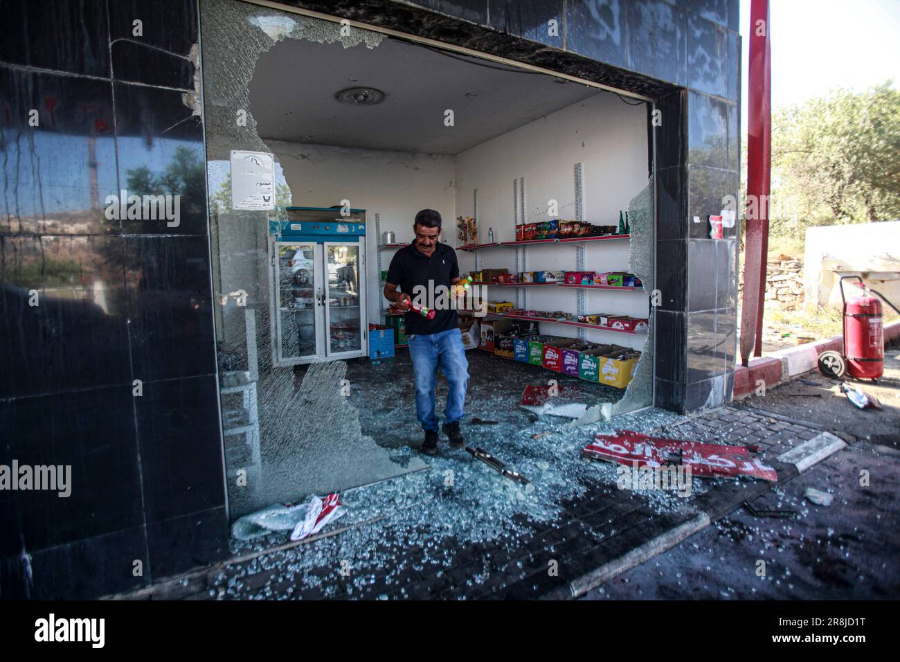 Al Laban Al Sharkiyeh, Palestine. 21st June, 2023. A Palestinian man ...
