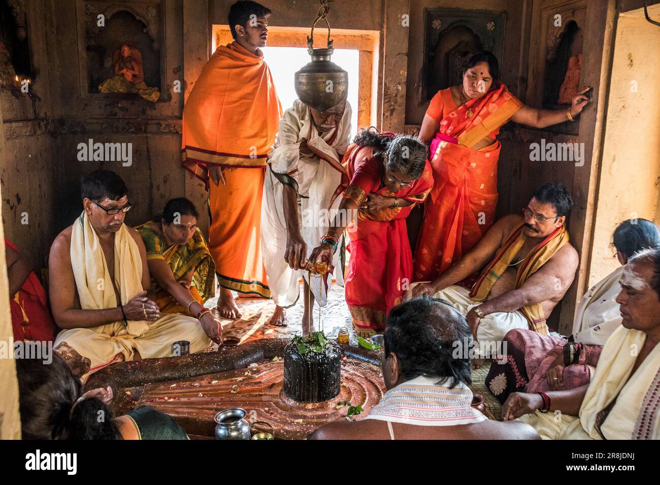 A religious ceremony underway in a temple on the ghats of Varanasi ...