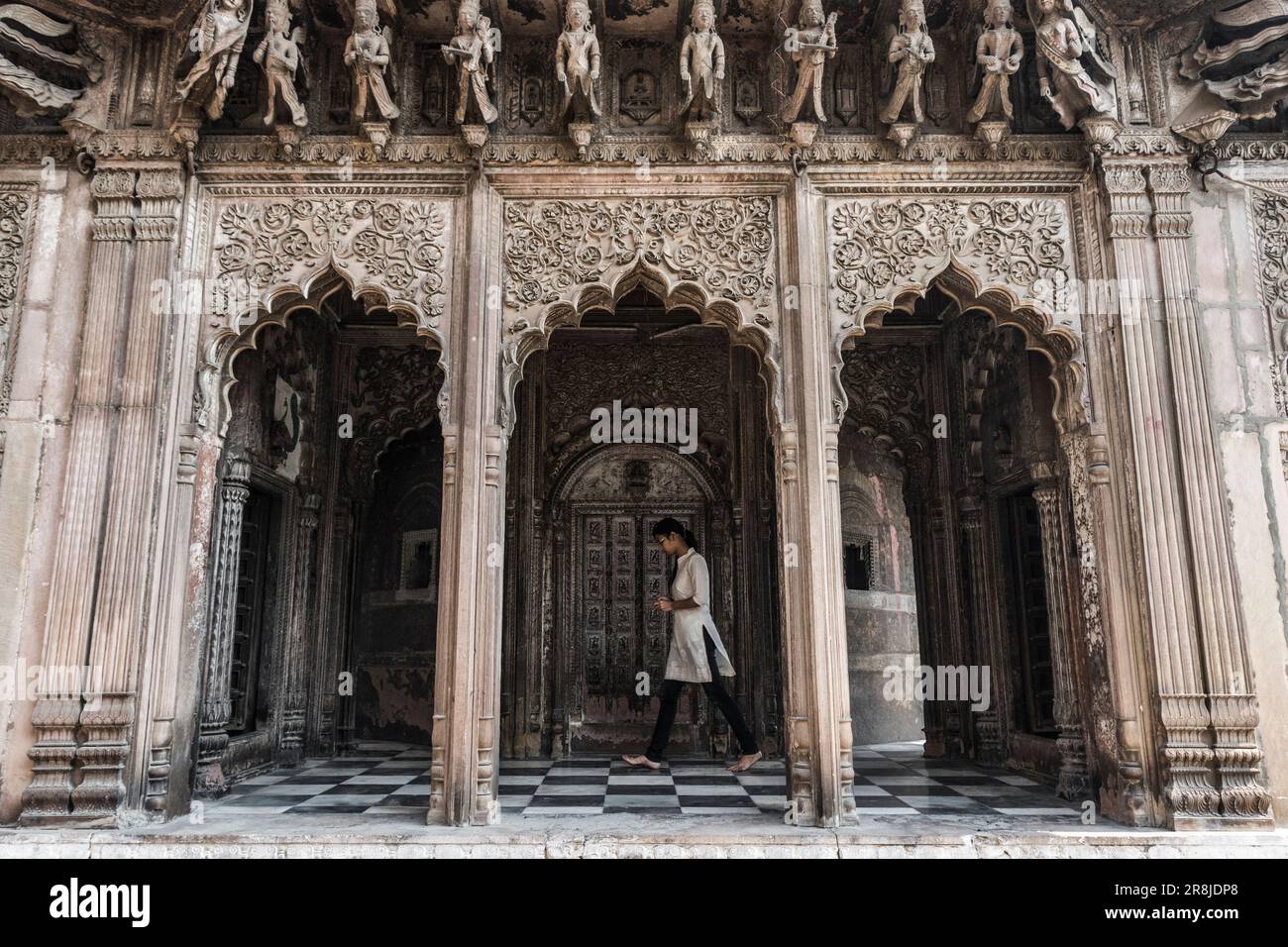 An ornately carved facade of the Shri Siddhi Vinayak Temple, Varanasi ...
