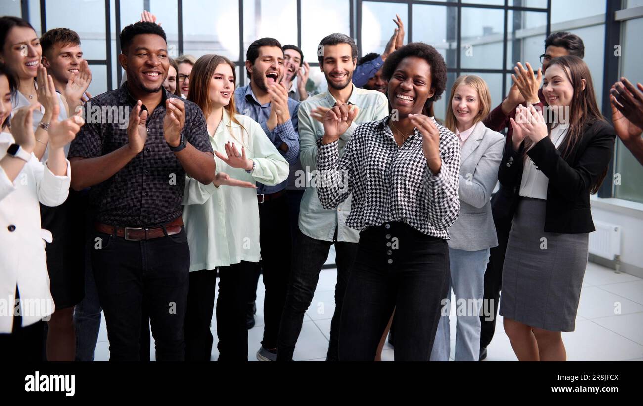 Business people clapping their hands after a seminar Stock Photo - Alamy