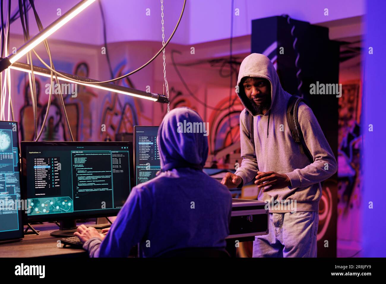 African american hacker bringing black box with technology for ...