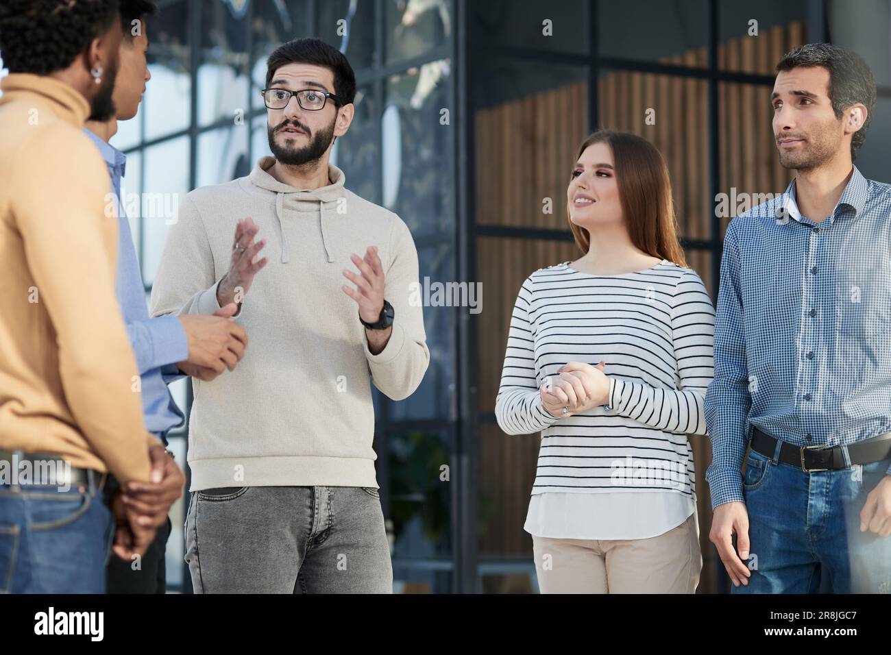 Business people stand and work in an office building Stock Photo - Alamy