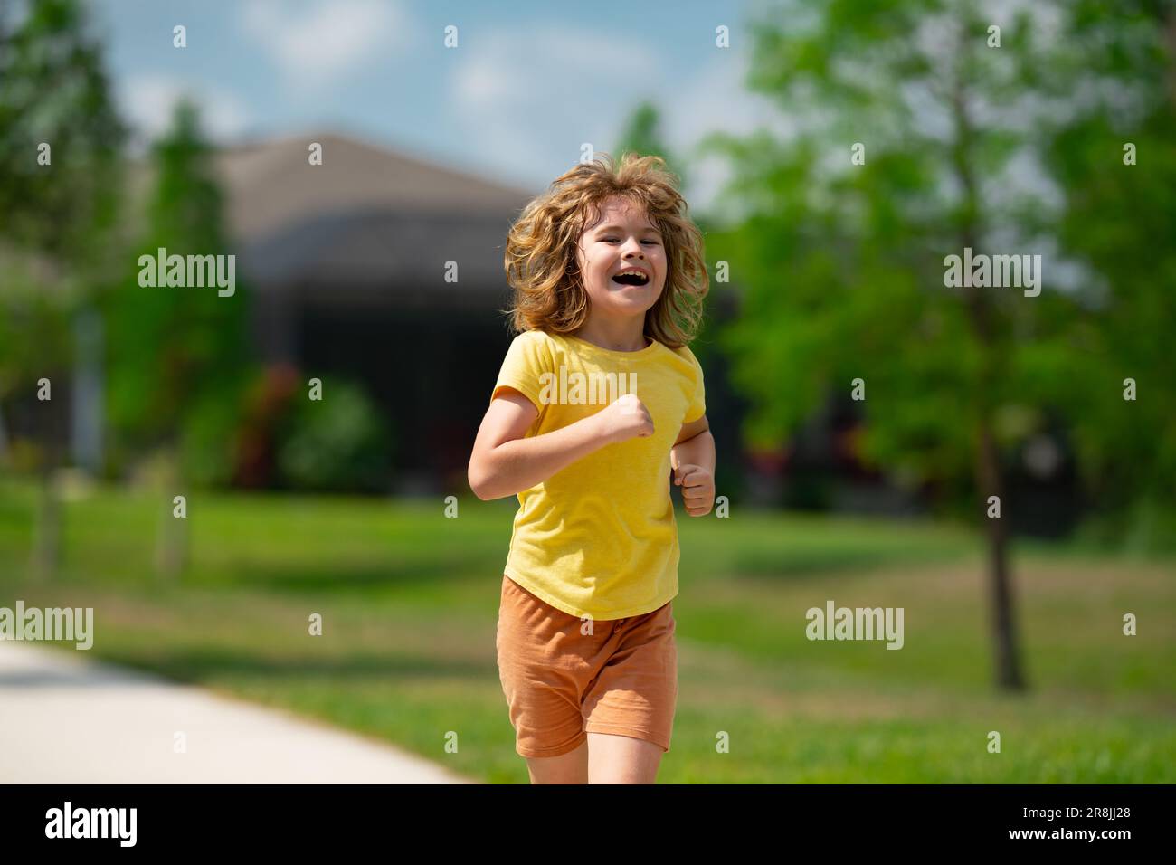 Kid running in summer street. Child enjoy run. Little boy running on ...