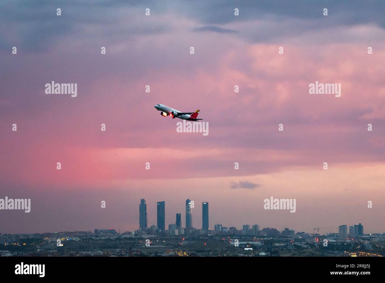 Madrid, Spain. 21st June, 2023. An Iberia airplane is seen flying over ...