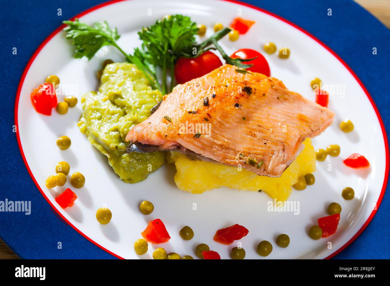 Fried trout fillets with mashed potato, guacamole Stock Photo - Alamy