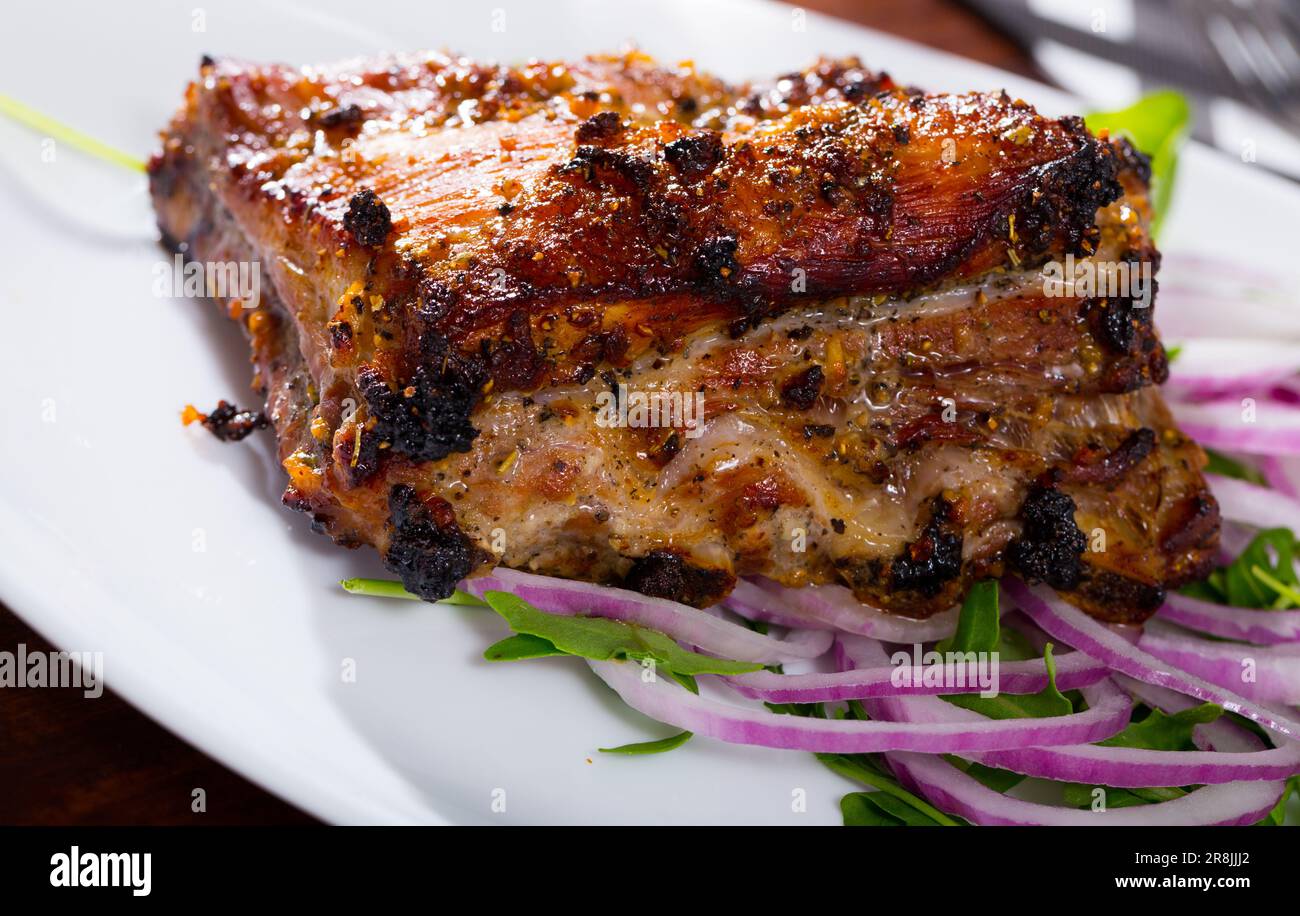 Roasted rack of pork Stock Photo - Alamy