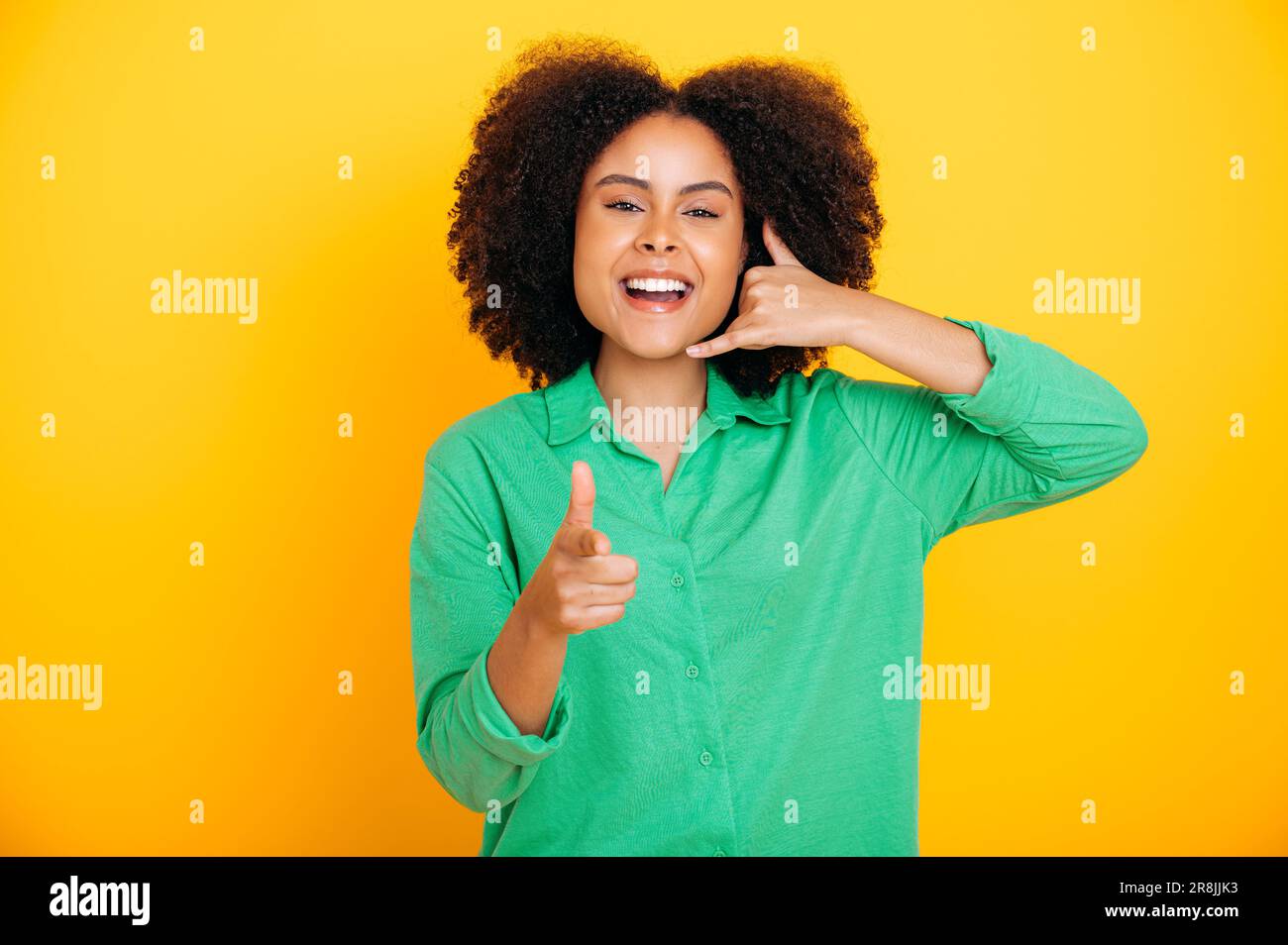 Call me back. Positive african american or brazilian curly woman ...