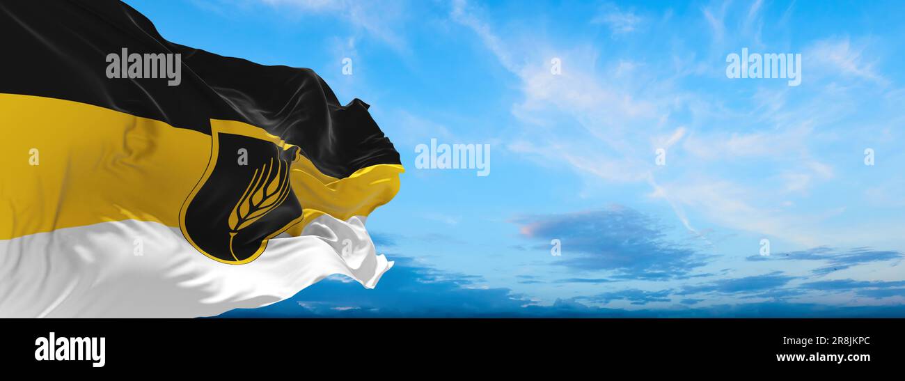 flag of German peoples Volga Germans at cloudy sky background ...