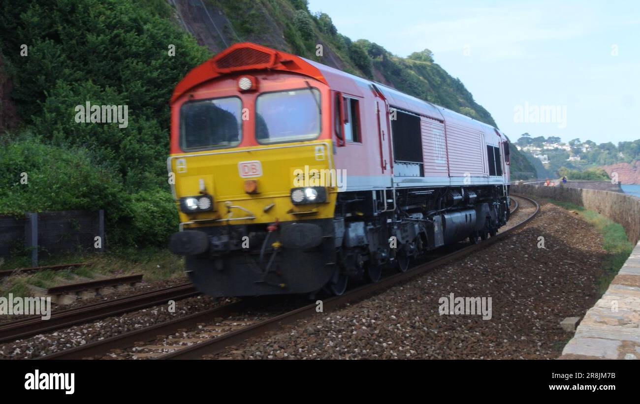 DB Cargo 66165 diesel electric locomotive at Teignmouth sea wall, Devon ...