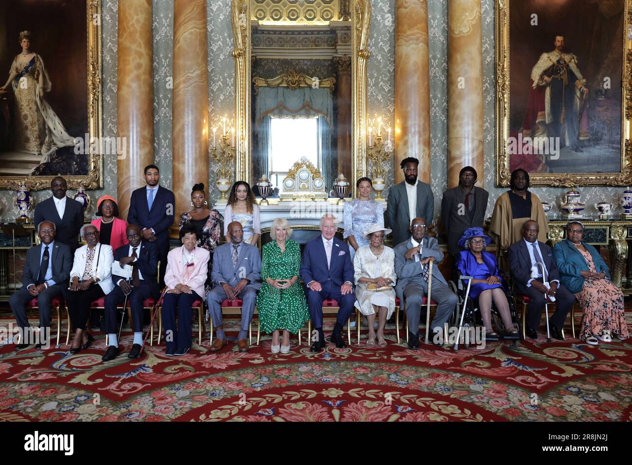 Britain's King Charles III and Queen Camilla pose with Linda Haye ...